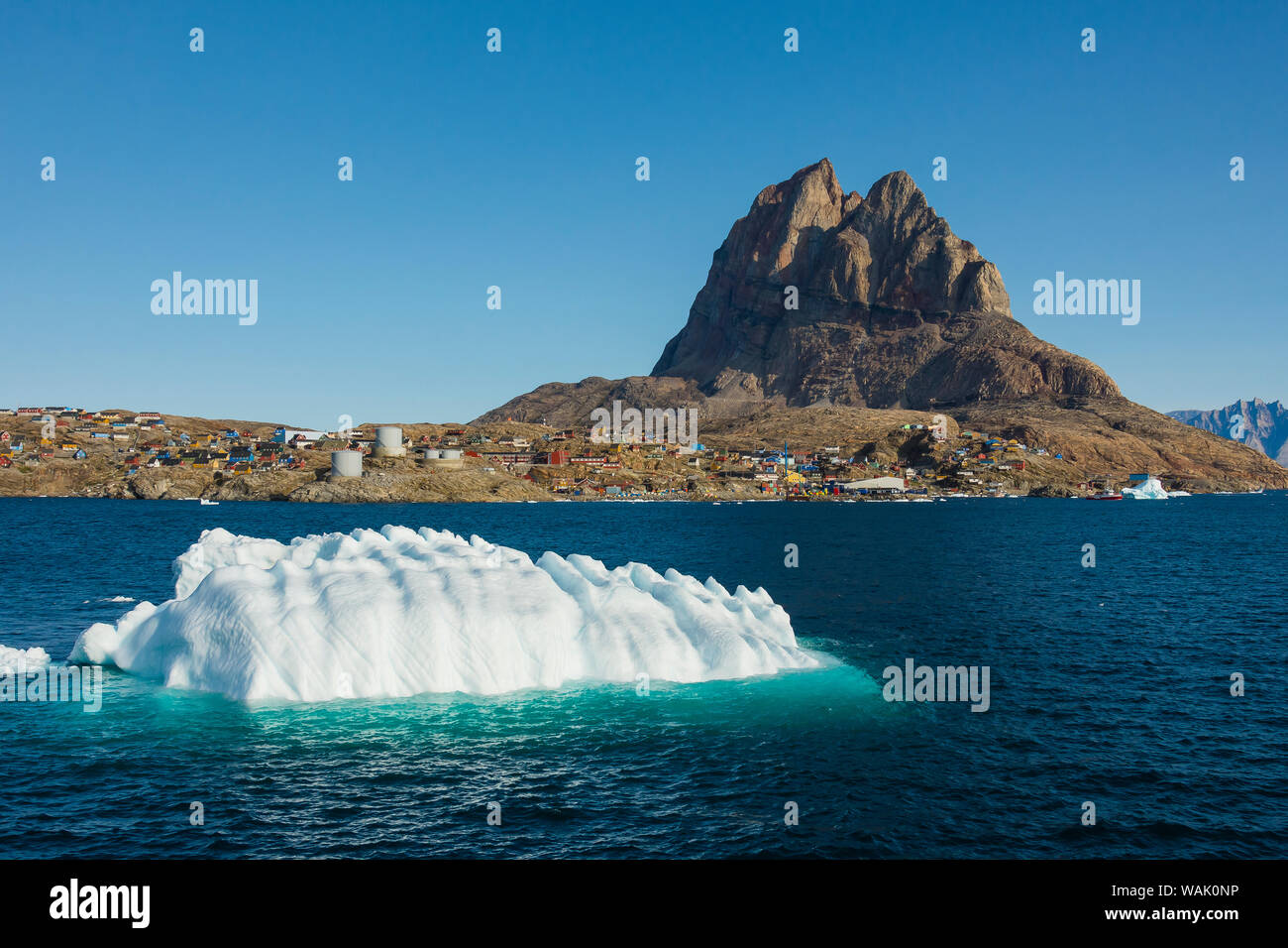 Greenland, Uummannaq. Heart-shaped Uummannaq mountain towers over the ...