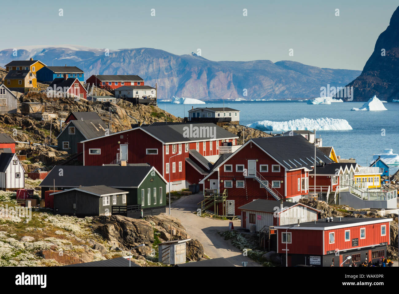 Greenland, Uummannaq. Icebergs fill the harbor and surrounding waters ...