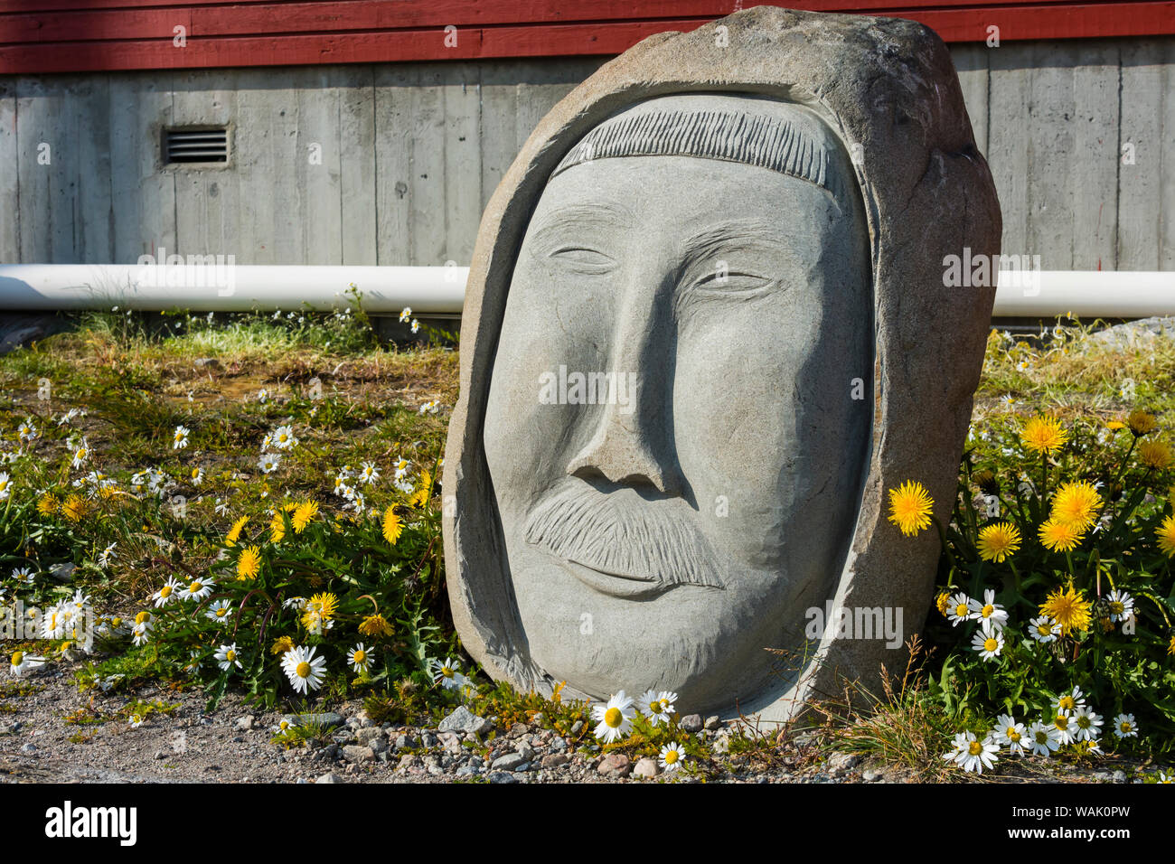 Greenland, Uummannaq. Carving of a Greenlandic man Stock Photo - Alamy
