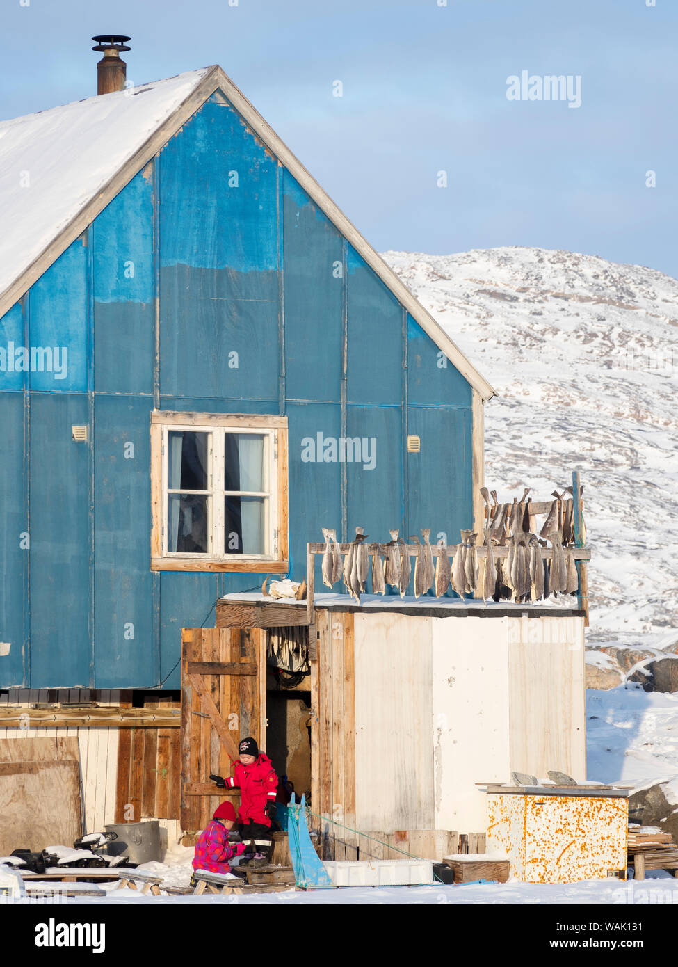 Ikerasak fishing village during winter in the Uummannaq Fjord, north of ...