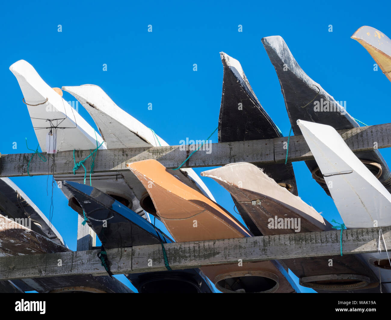 Traditional kayaks at the waterfront of the old colonial harbor. Nuuk ...