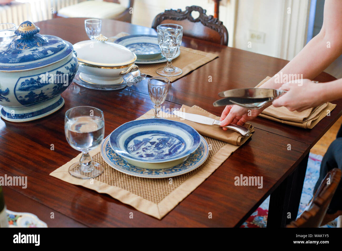 Person Setting The Table Clipart