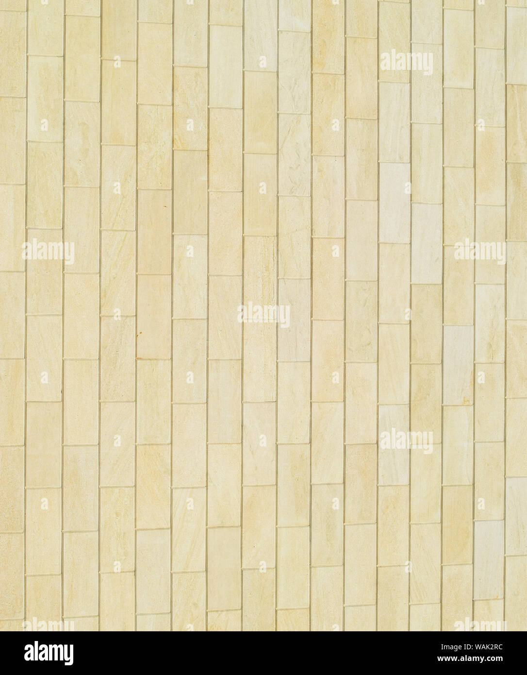 Background of yellow bricks. Wall of yellow bricks. The texture of the ...