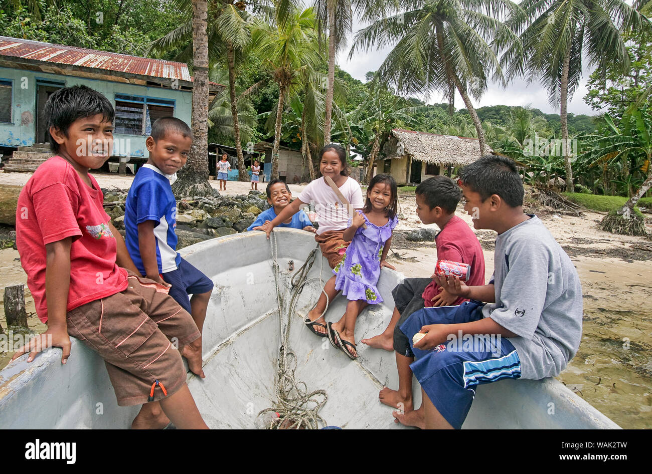 Child sitting boat hi-res stock photography and images - Alamy