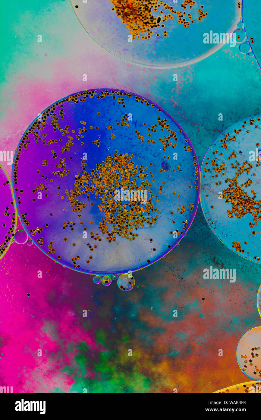 Oil bubbles inside water base form patterns Stock Photo - Alamy