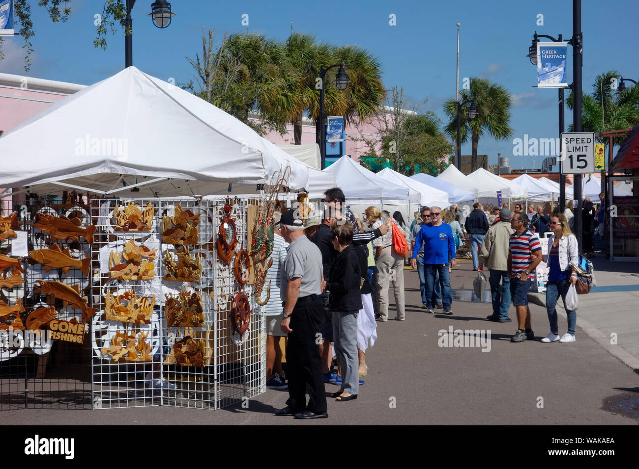 Tourists and locals perusing the arts and crafts fair Stock Photo - Alamy