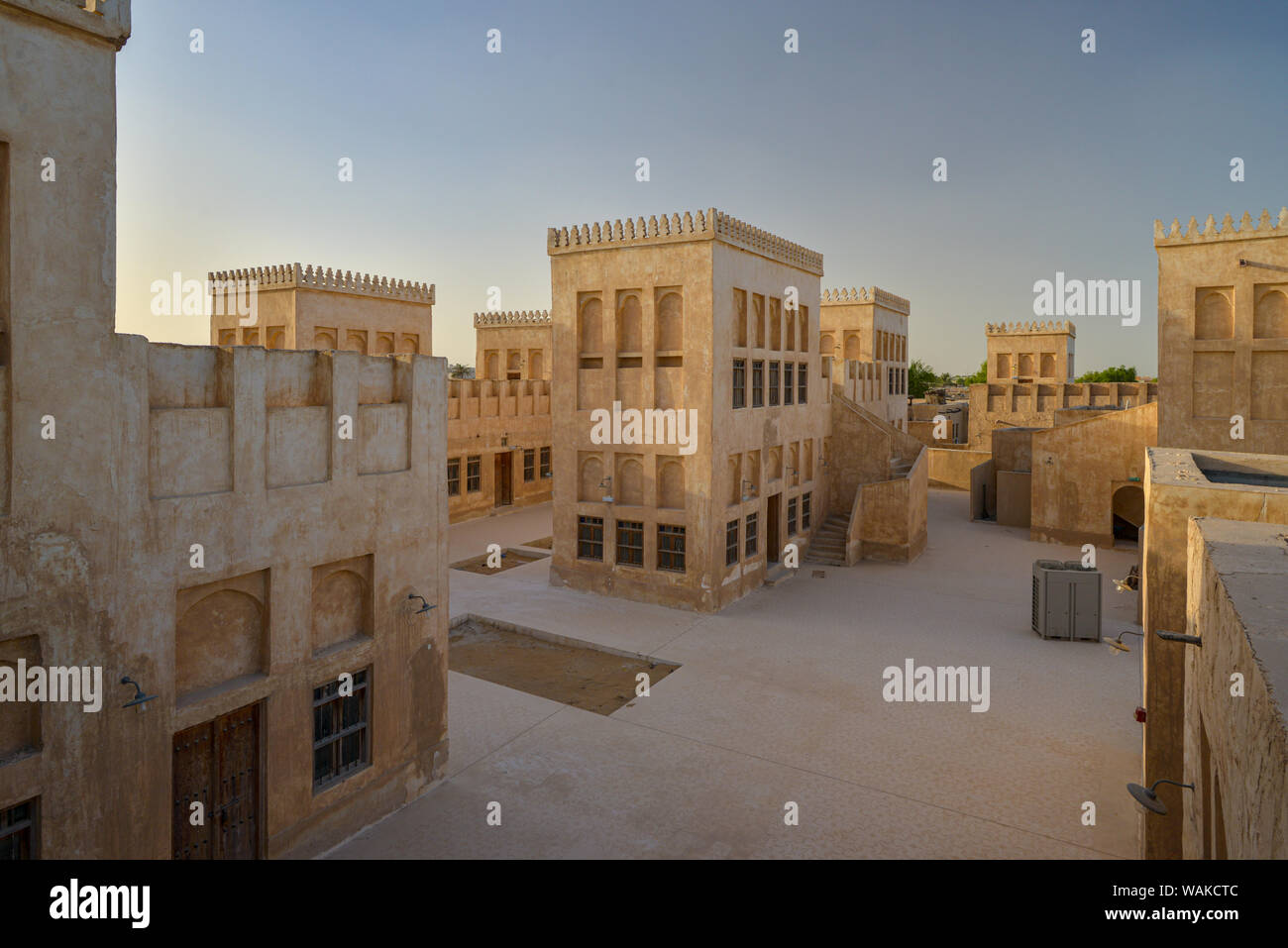 Various traditional buildings of the souq taken at dusk from the first ...