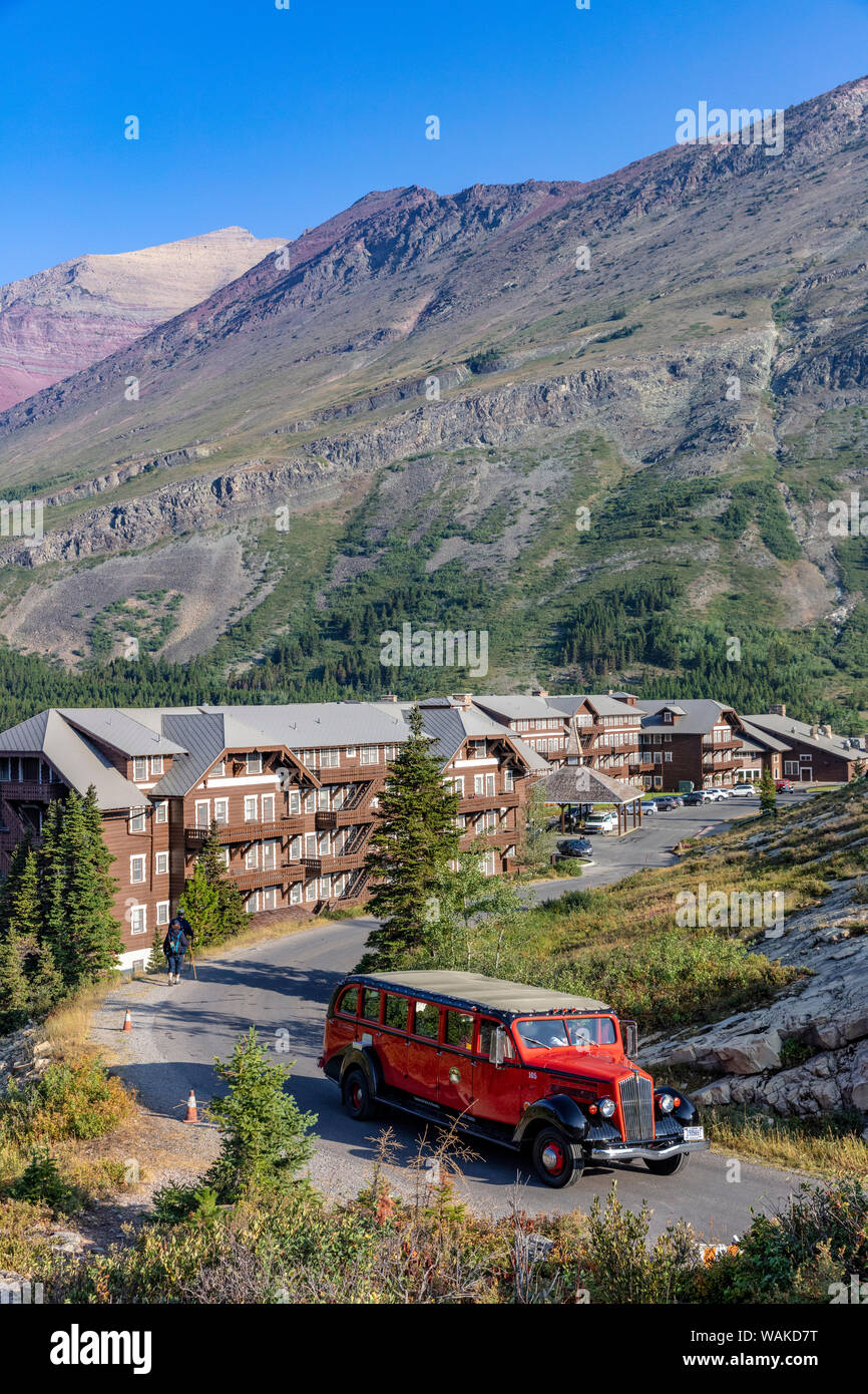 Red Jammer bus departing the Many Glacier Hotel in Glacier National ...