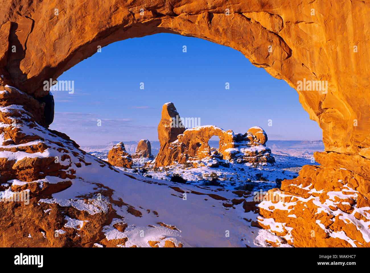 Morning light on North Window framing Turret Arch in winter, Arches ...