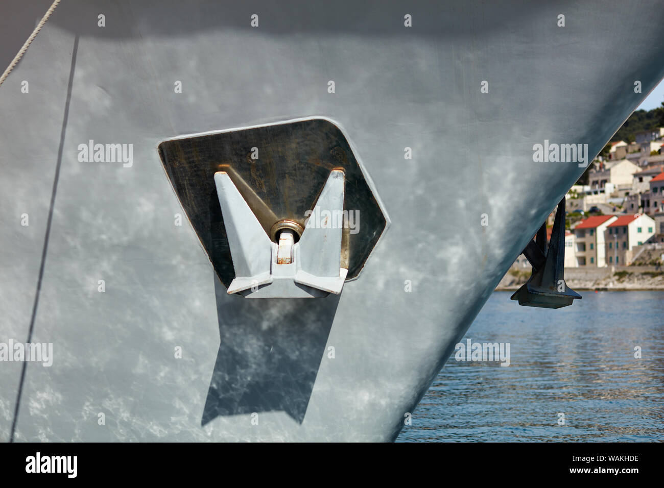The bow of a tourist ship moored in the port, in the town of Pucisca on ...