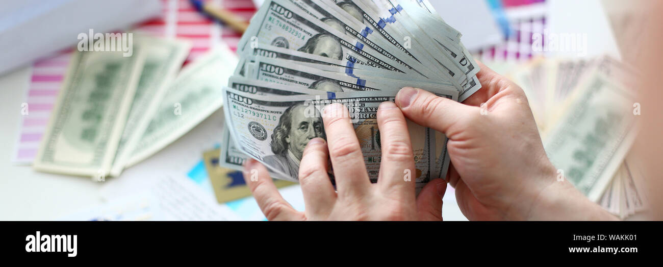 Counting money hi-res stock photography and images - Alamy