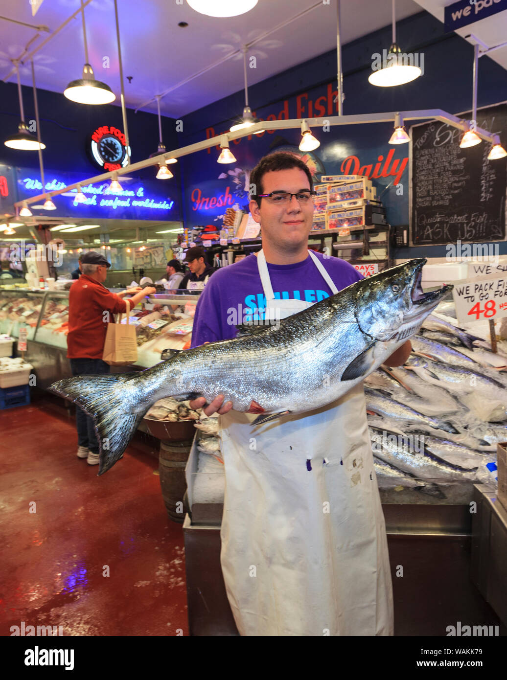 Vendor at Pure Food Fish Market, Pike Place Market, Seattle, Washington ...