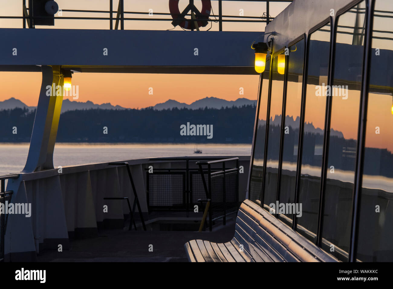 USA, Washington State, Seattle. Sunset and Olympic Mountains reflected ...