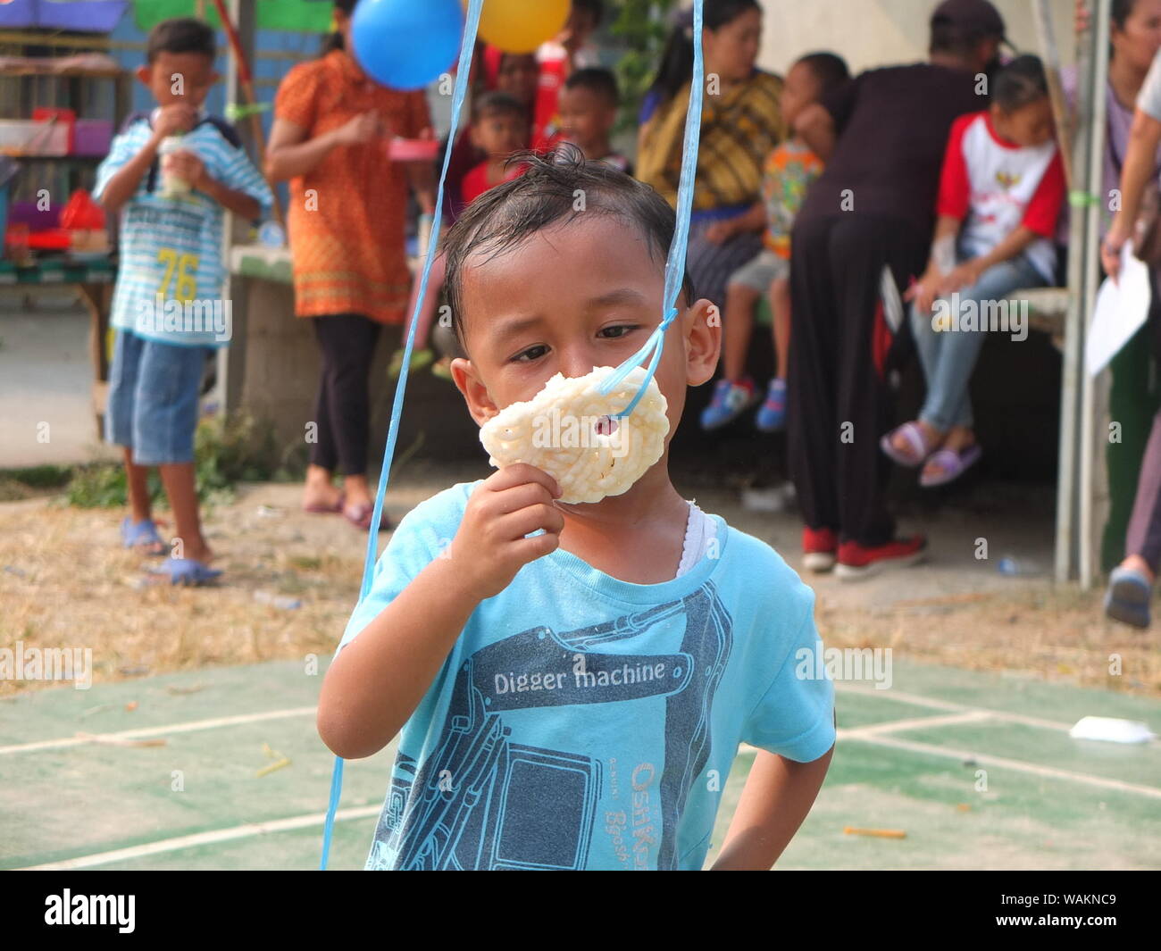 children's crackers eating competition, celebration of Indonesia's 74th ...
