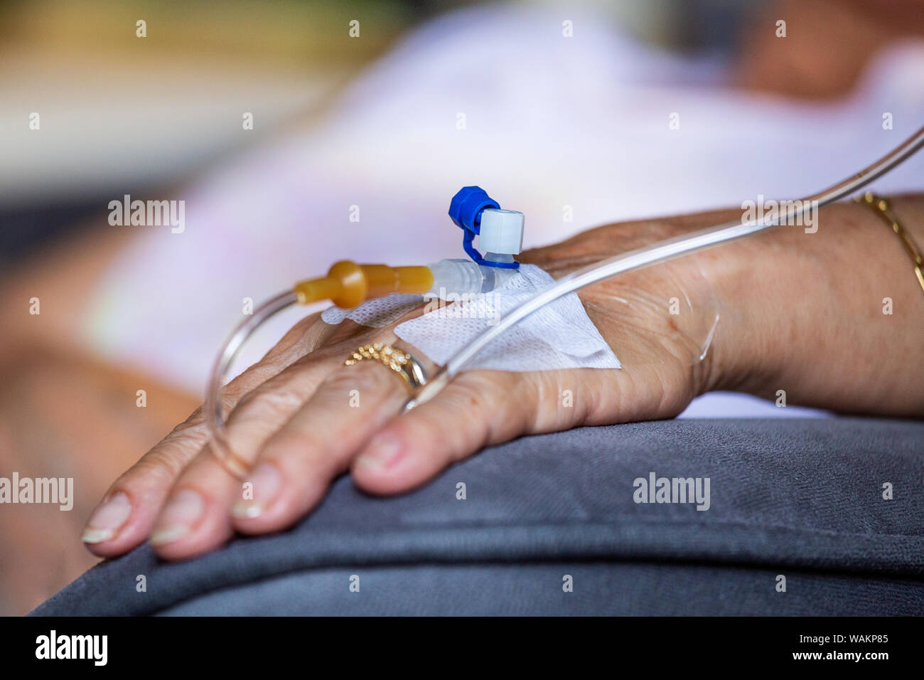 Close-up of senior hand with venous catheter. Close up hand of old ...