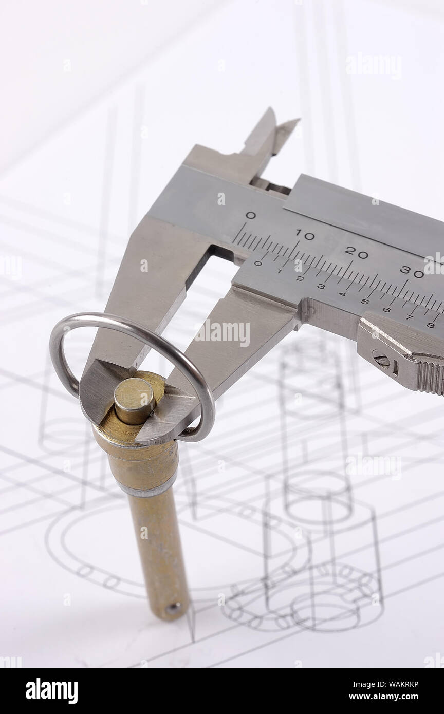 Calipers and pip-pin on a technical drawing Stock Photo - Alamy