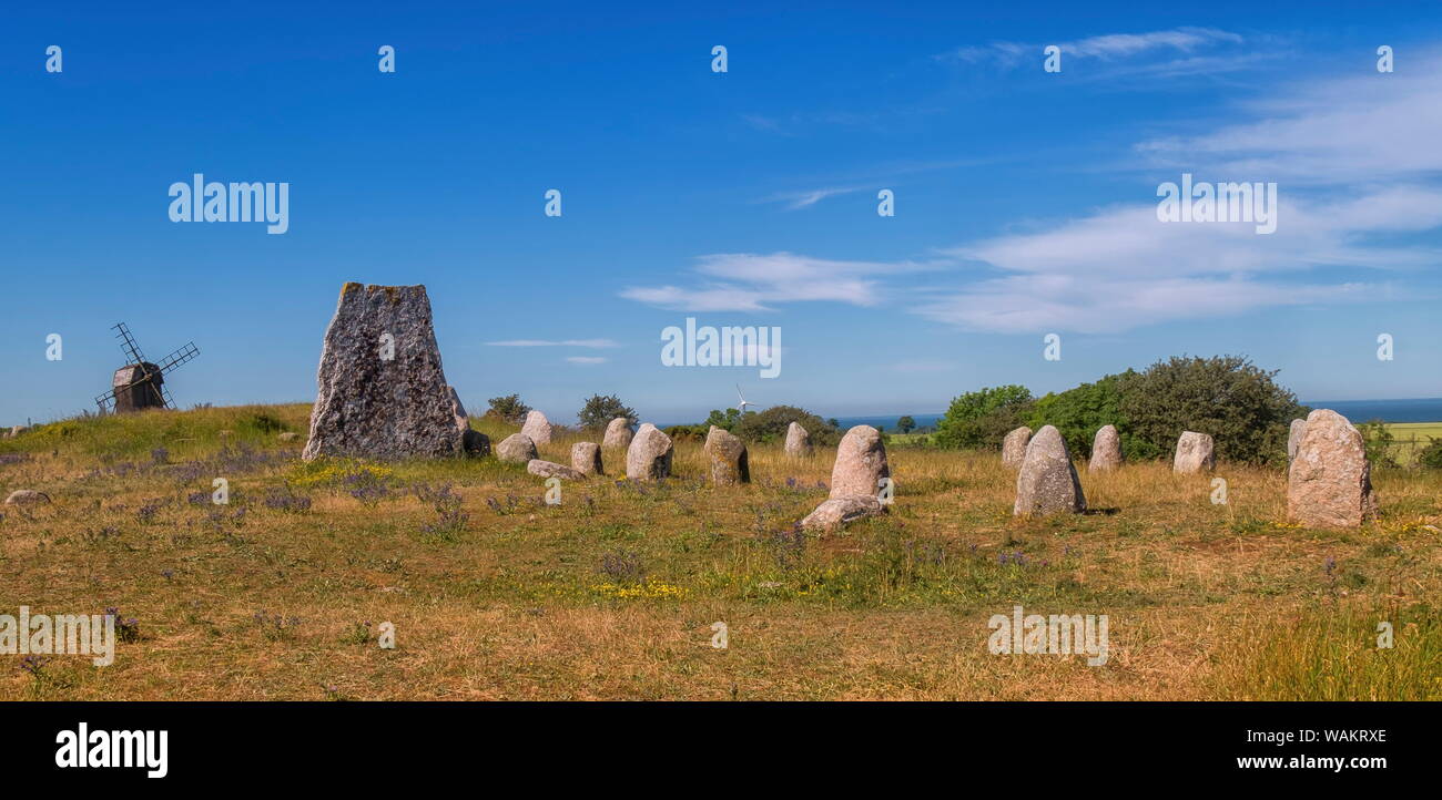 Viking stone ship burial and old windmill in Oland island by beautiful ...