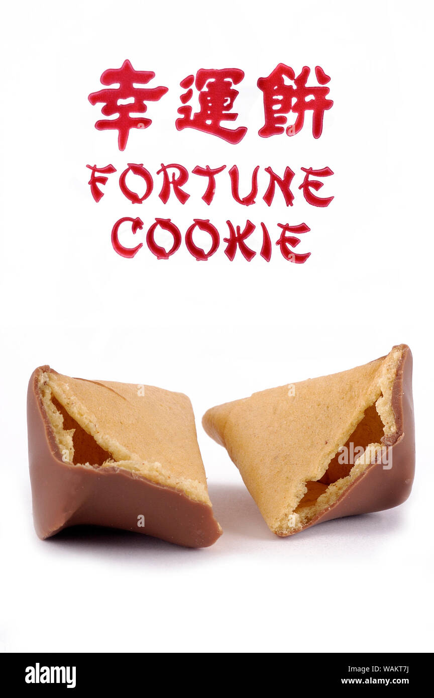 A broken fortune cookie isolated on a white background Stock Photo - Alamy