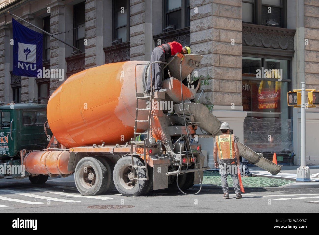 Construction crew pouring concrete on hi-res stock photography and ...