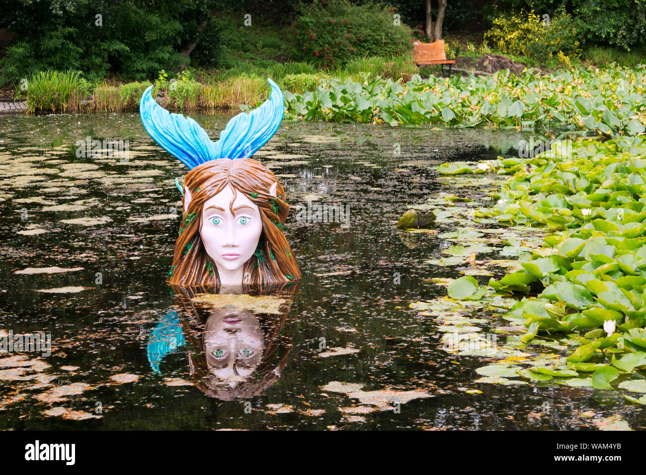 Model mermaid in a Lily Pond in Victoria Park at the 2019 Southport ...