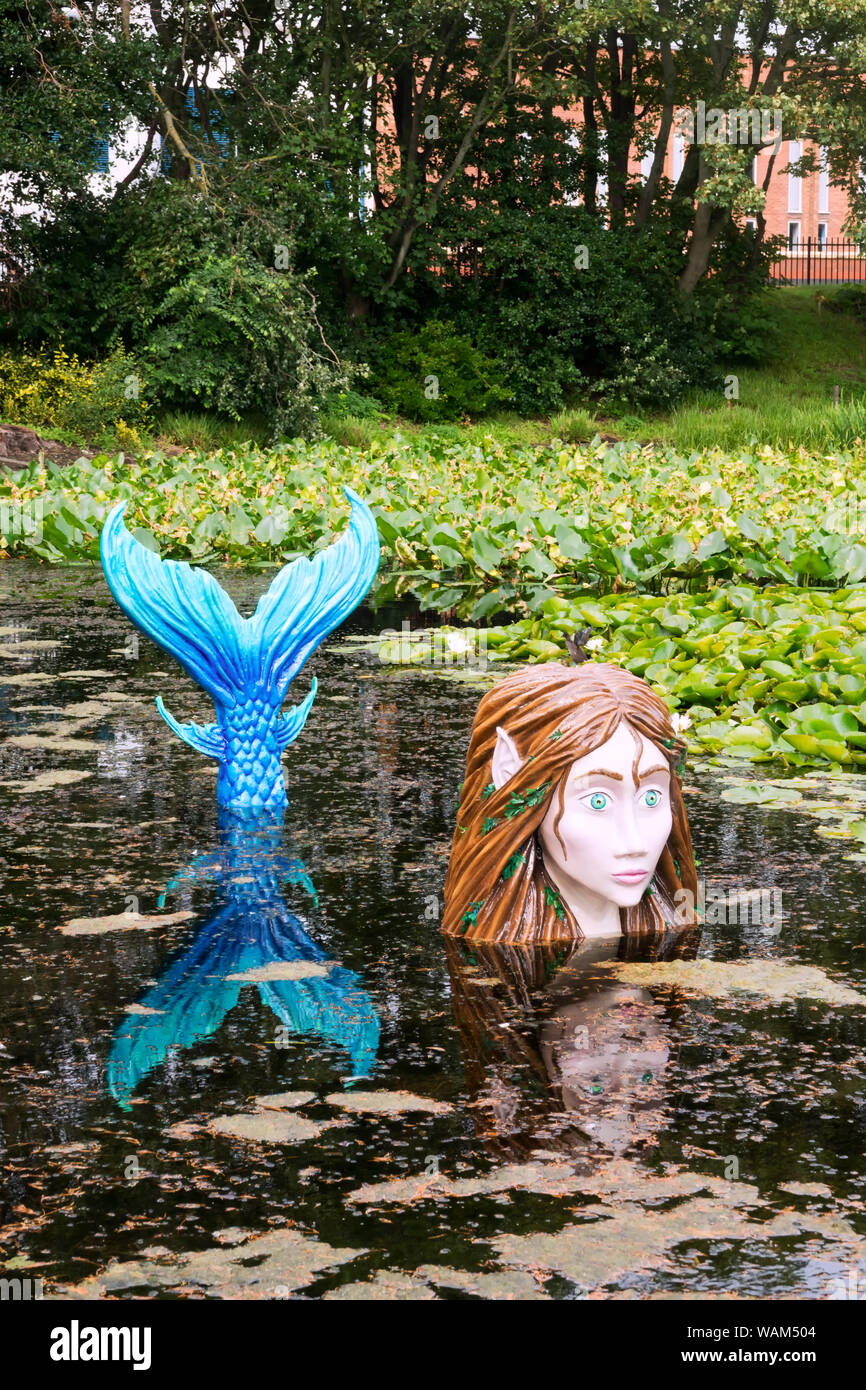 Model mermaid in a Lily Pond in Victoria Park at the 2019 Southport ...