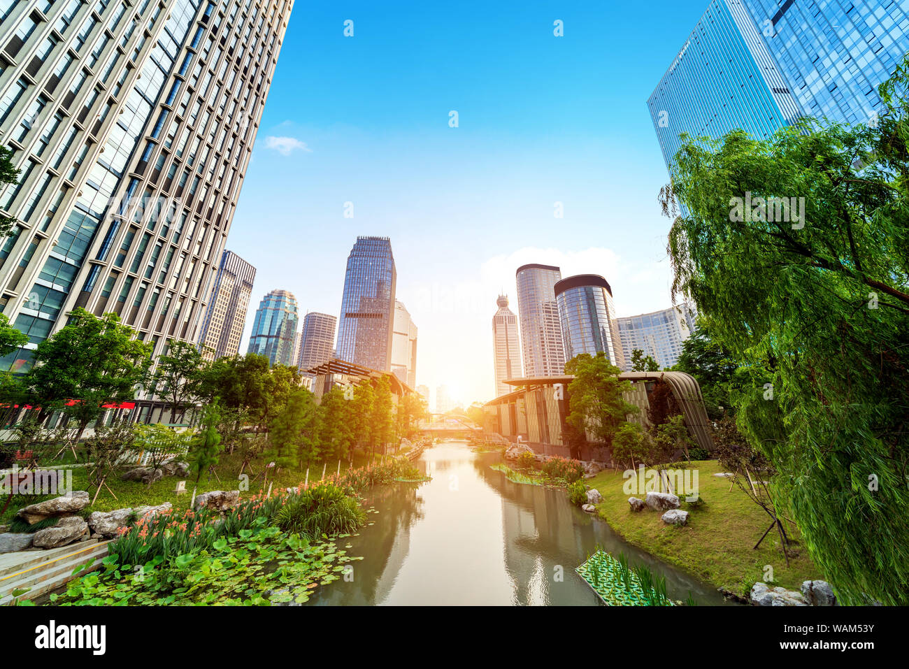 A modern building standing on both sides of the creek, Hangzhou, China ...