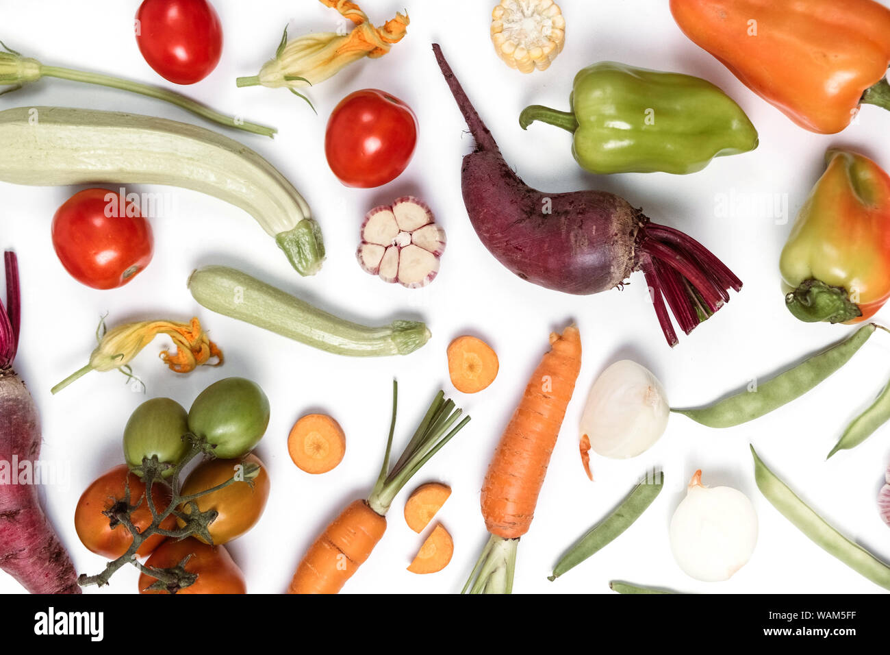 Creative layout made of vegetables. Healthy eating concept. Tomatoes ...