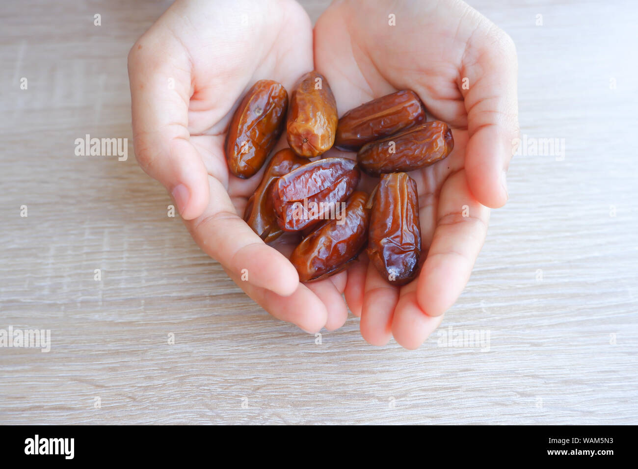 Dried palm dates hi-res stock photography and images - Alamy