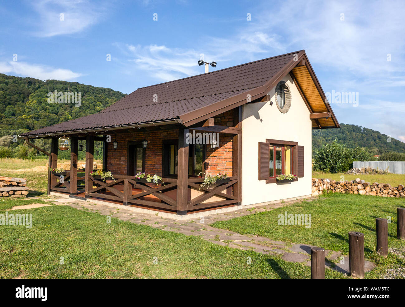 Beautiful house in nature Stock Photo - Alamy