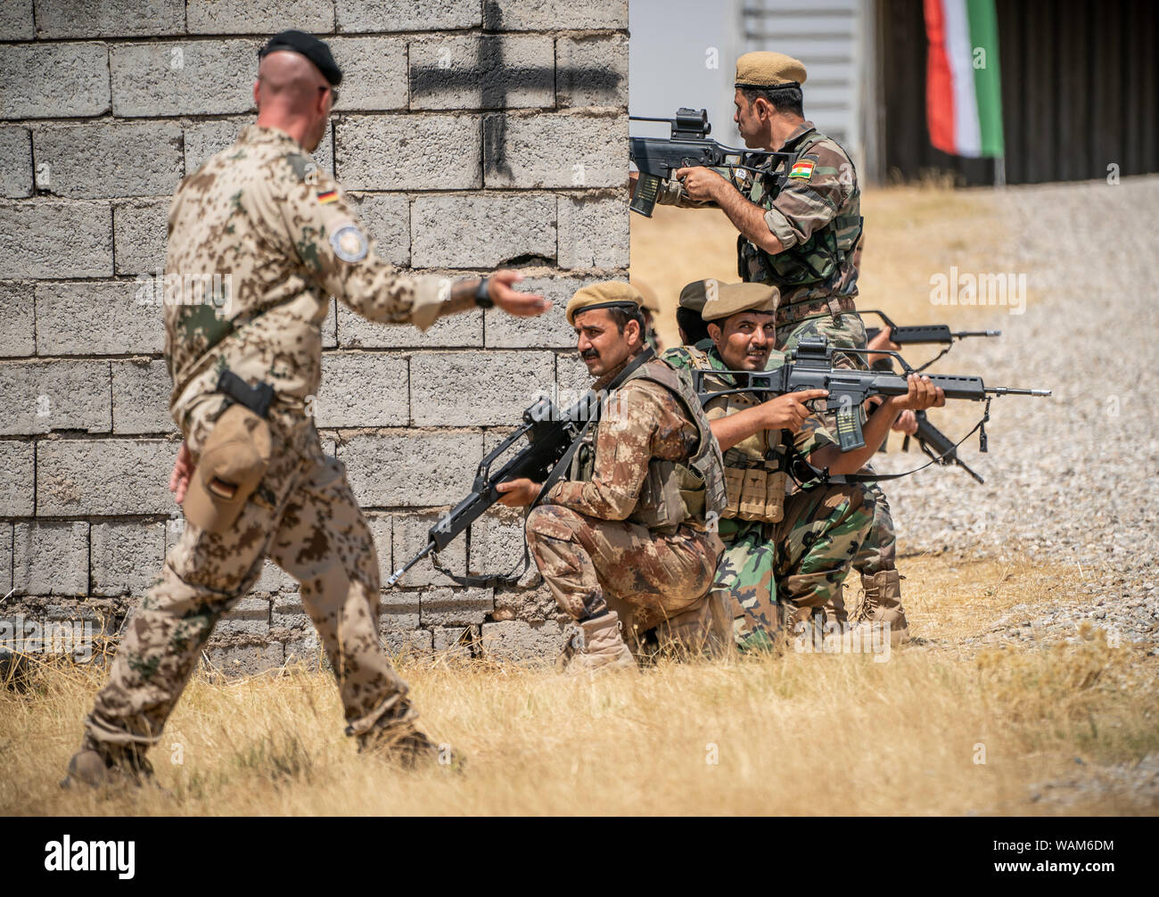 Erbil, Iraq. 21st Aug, 2019. A Bundeswehr soldier (l) accompanies the ...