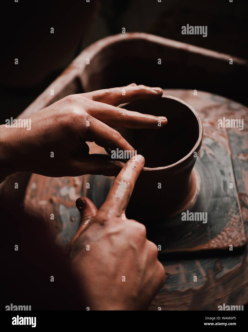 Person's hands and fingers crafting a clay pot Stock Photo - Alamy