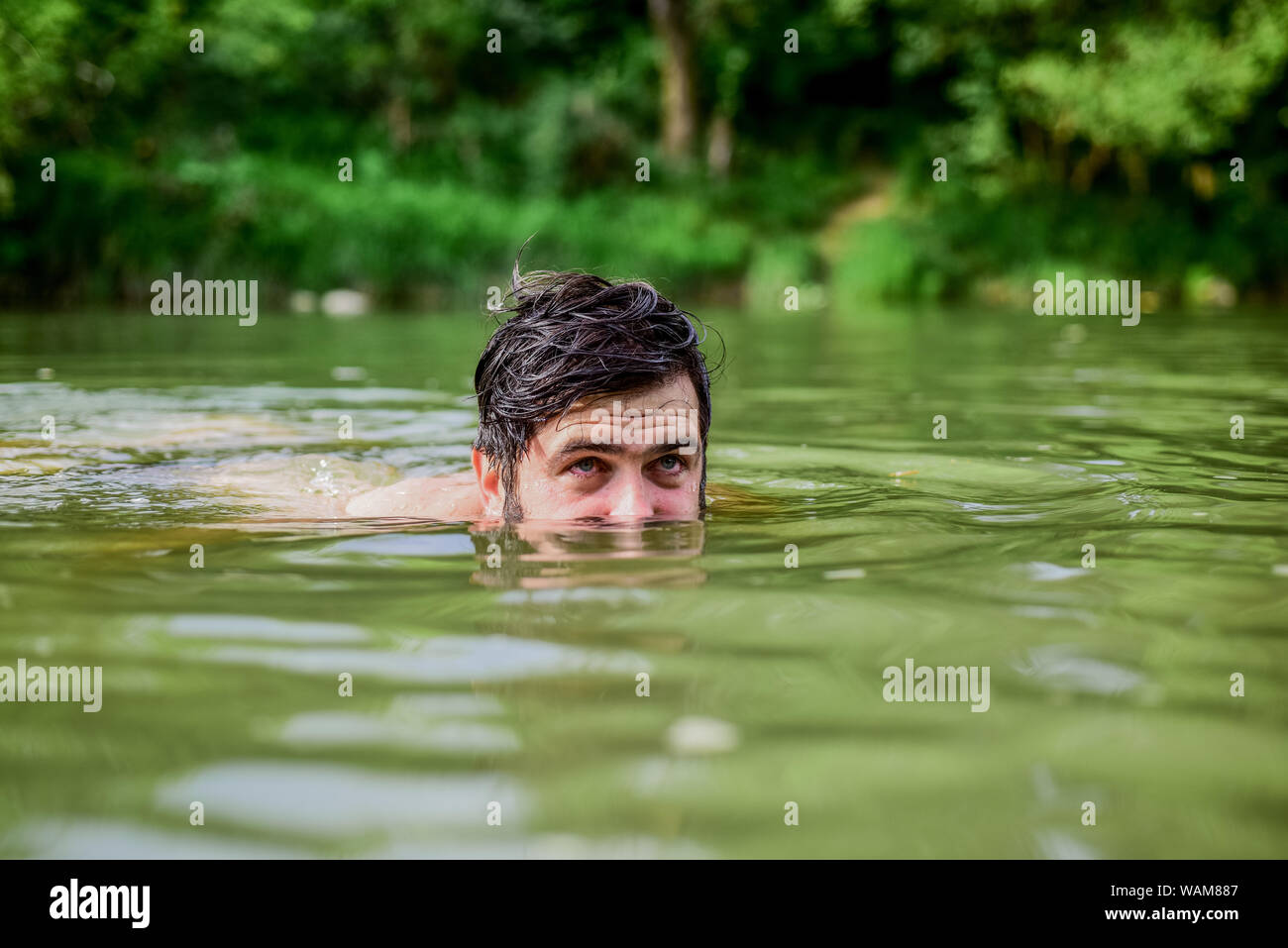 Swimming sport. Freshness of wild nature. Summer vacation. Relaxation ...
