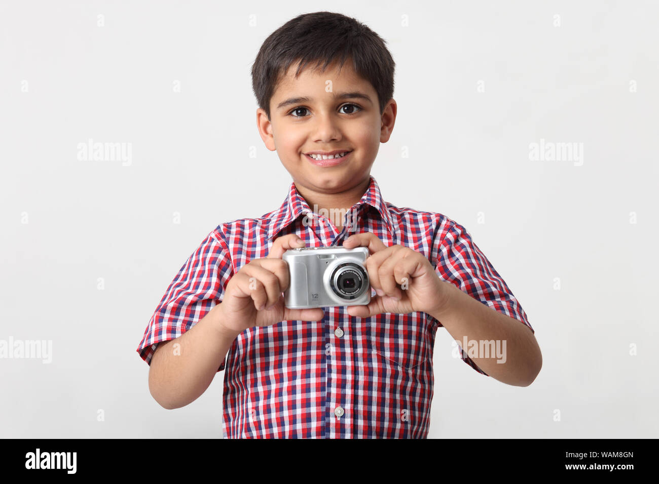 Boy smiling at camera 7 8 years hi-res stock photography and images - Alamy