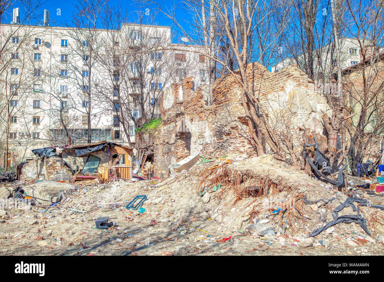 ruined house in modern city Stock Photo - Alamy