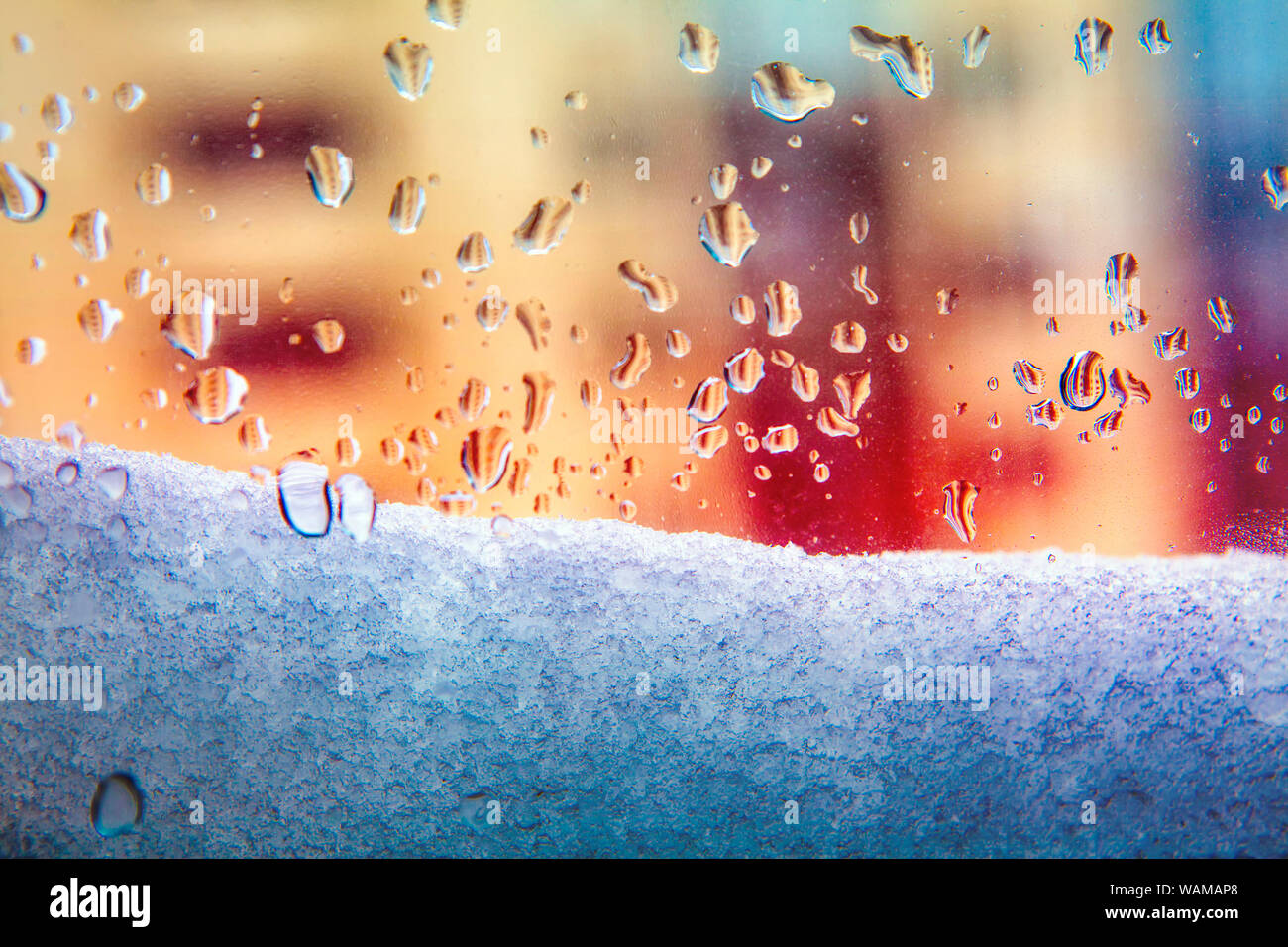 snow and water drops on the window Stock Photo - Alamy