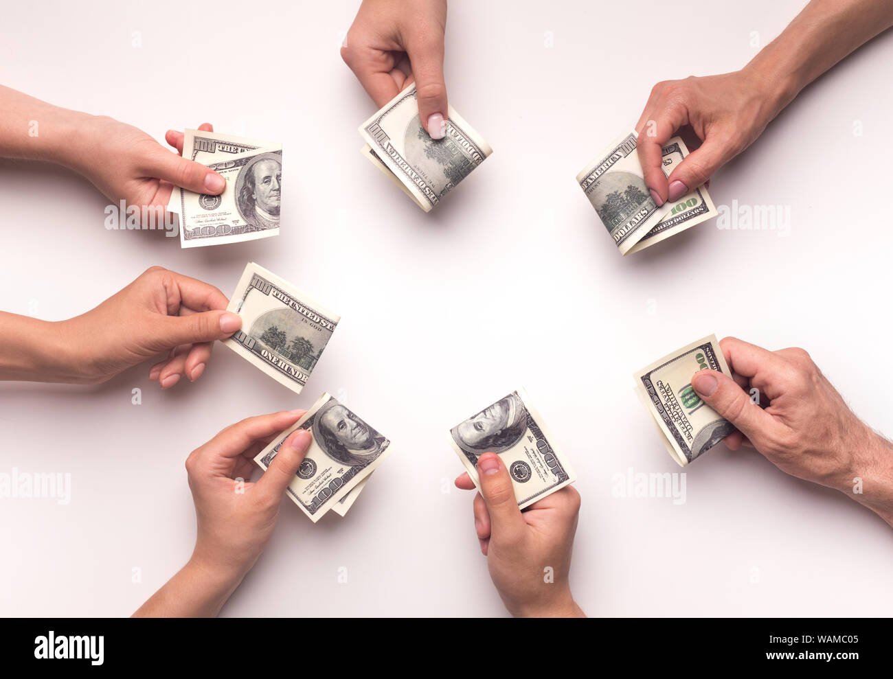 Shareholders deciding to collect big amount of mone Stock Photo - Alamy