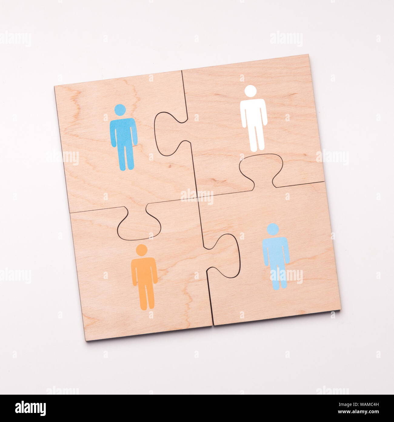 Puzzle of four pieces with people who connecting for helping Stock ...