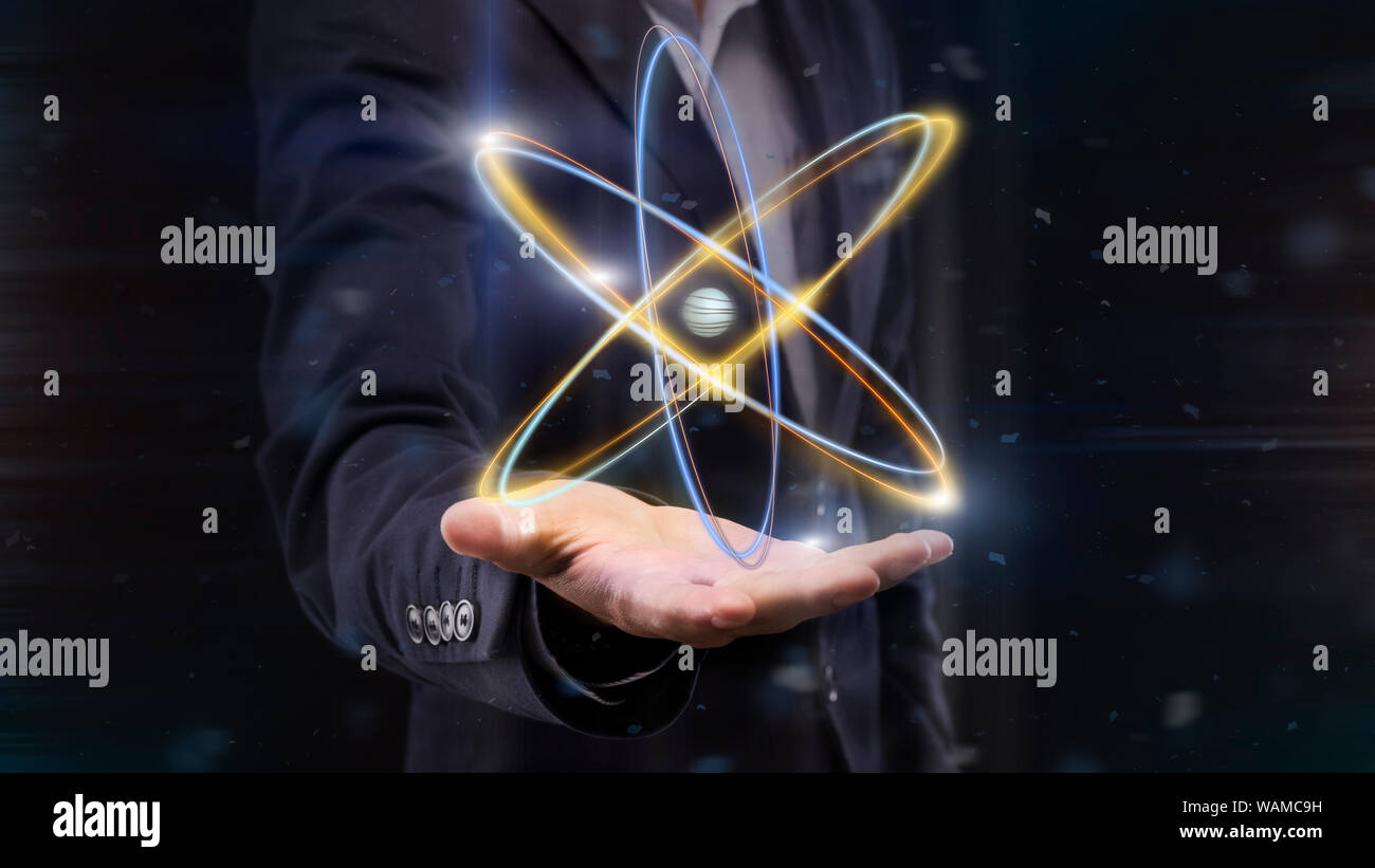 Hologram of atom on male hand, panorama Stock Photo - Alamy