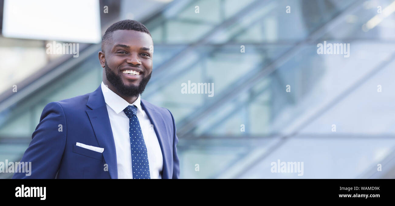 Cheerful Black Business Guy Smiling At Camera In Urban Area Stock Photo ...