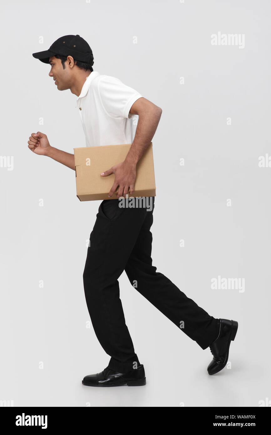 Man cardboard box hi-res stock photography and images - Alamy