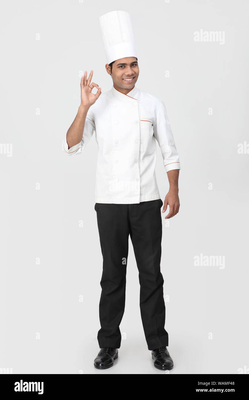 Chef showing ok sign and smiling Stock Photo - Alamy