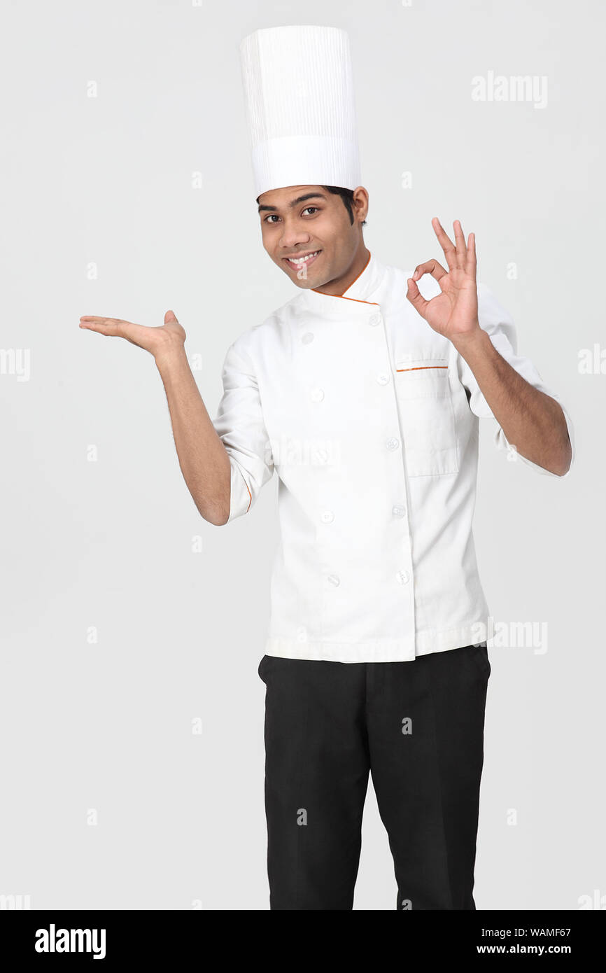 Chef showing ok sign and smiling Stock Photo - Alamy