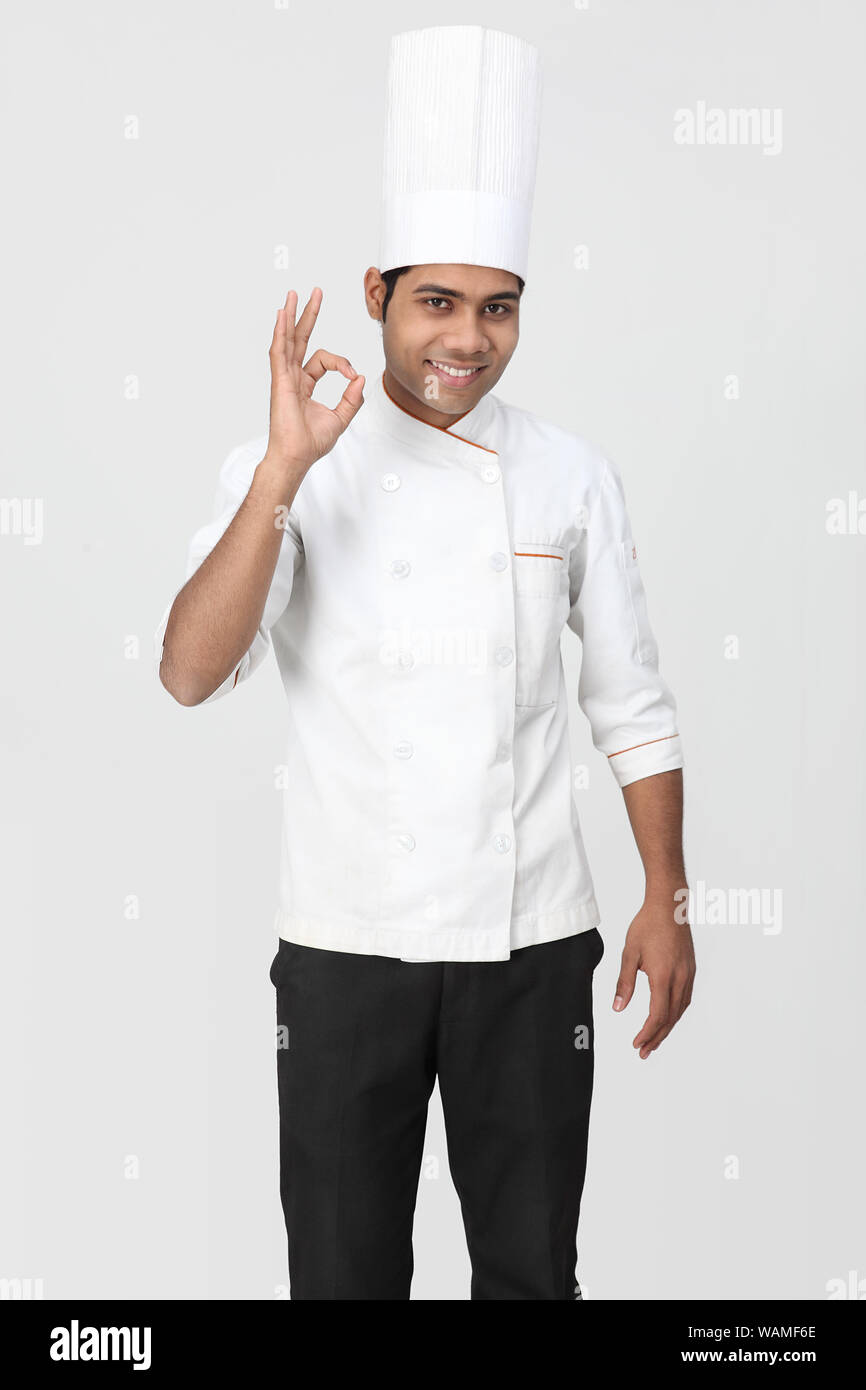 Chef showing ok sign and smiling Stock Photo - Alamy