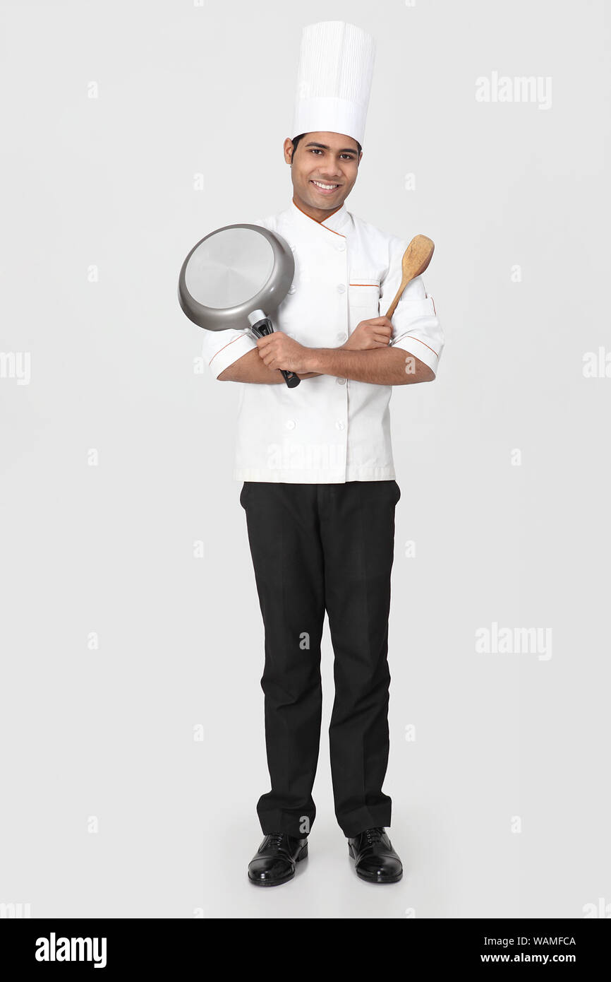 Indian man cooking, white background hi-res stock photography and ...