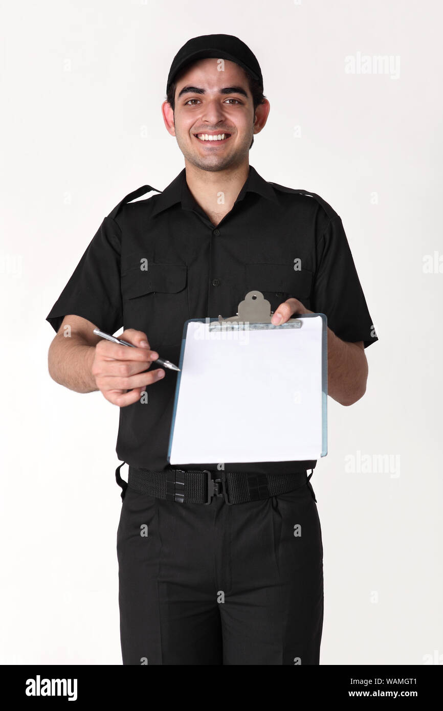 Delivery man giving clipboard for signing Stock Photo - Alamy