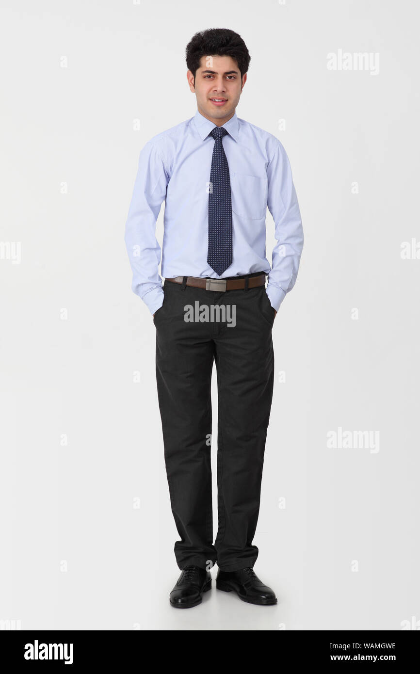 Indian man hands in pockets studio hi-res stock photography and images ...