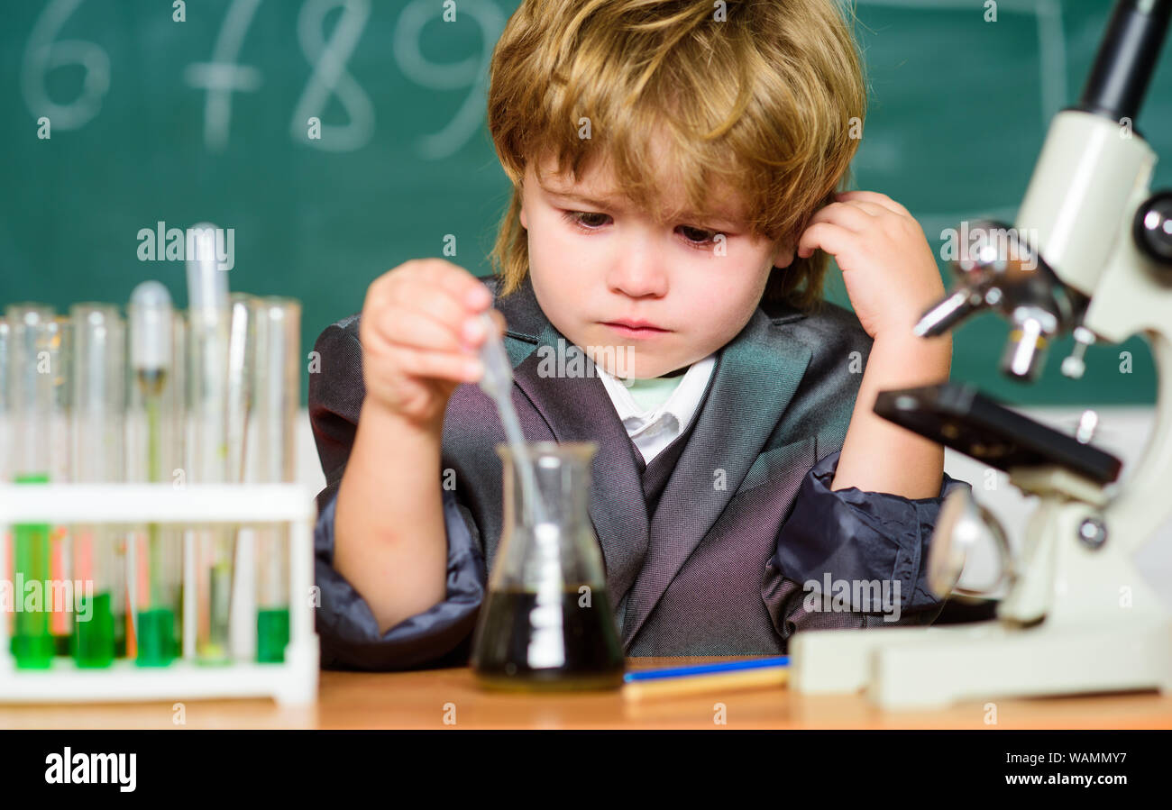 Science concept. Gifted child and wunderkind. Kid study chemistry ...