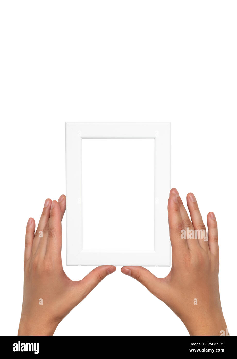 White photo frame in female hands. Empty white frame template Stock ...