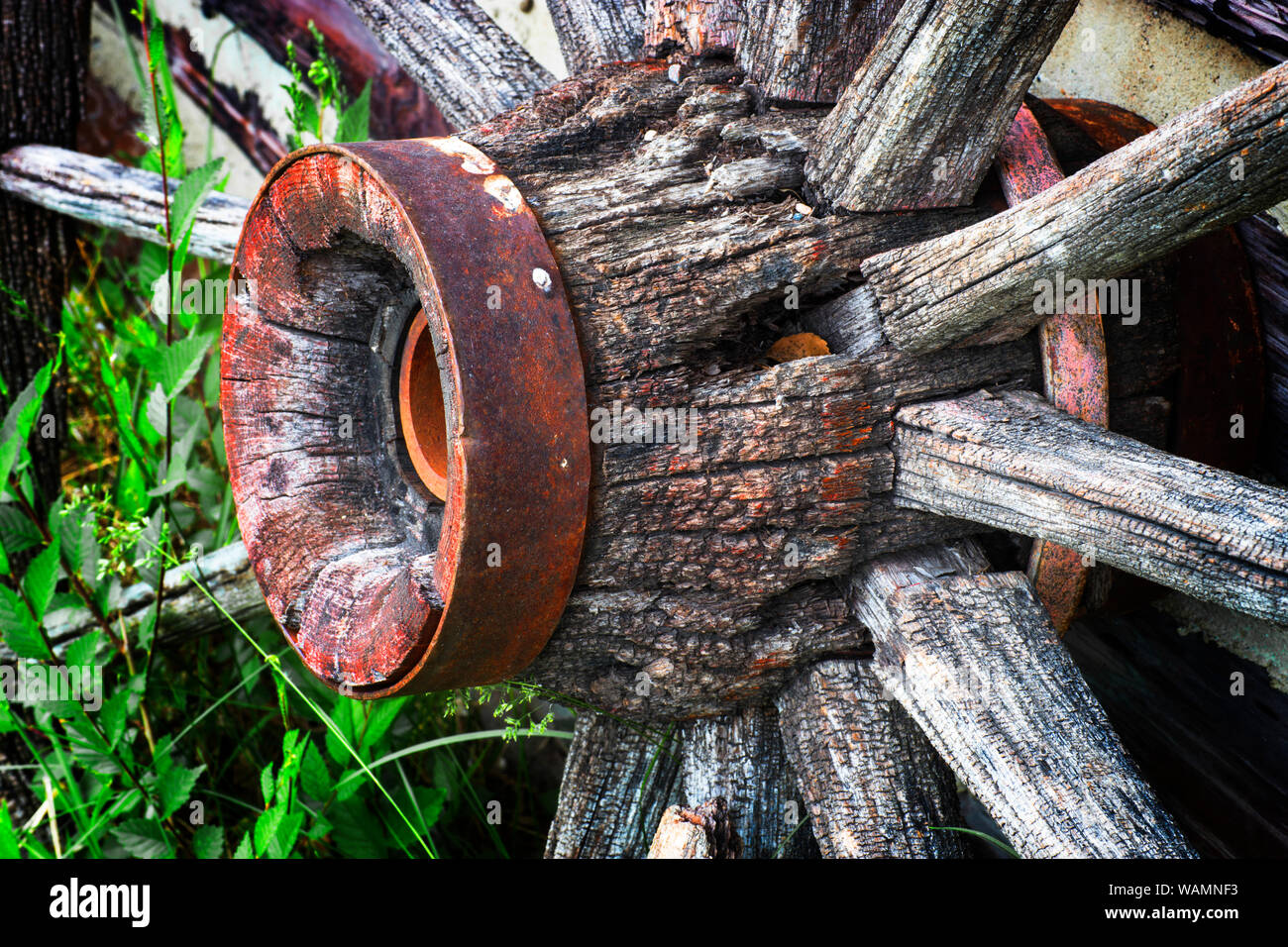 Antique wagon wheels dating back to the late 1800's leaning against ...