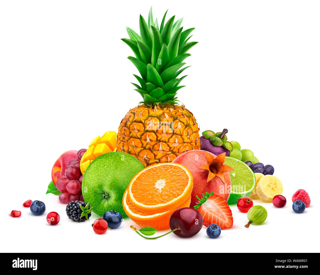 Heap of different whole and sliced tropical fruits isolated on white ...